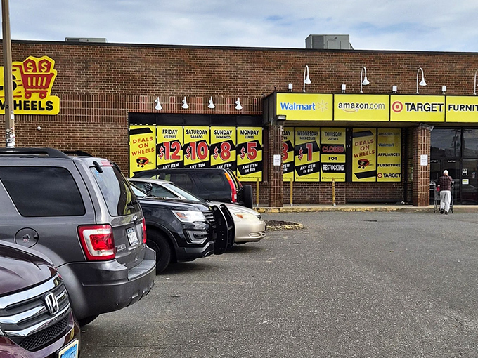 The storefront tells you everything you need to know: big yellow signs with prices that drop daily until Sunday's grand finale &ndash; the legendary $1 day.