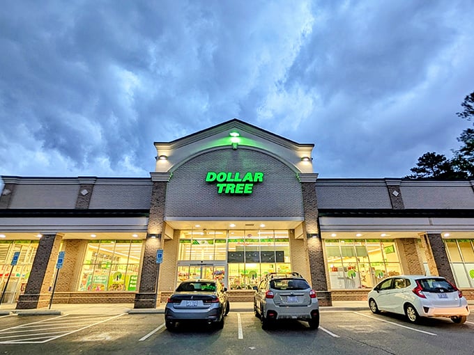 The gleaming green Dollar Tree sign beckons like a budget-friendly lighthouse, guiding thrifty shoppers to safe harbor in Cary's retail landscape.