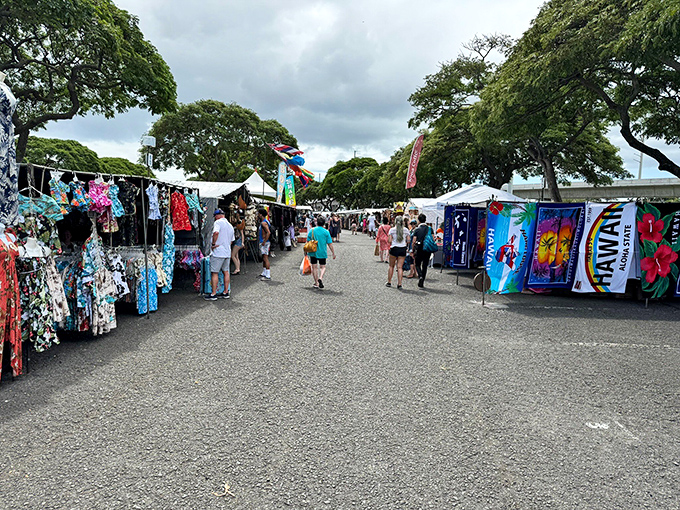 The ultimate Hawaiian shopping marathon &ndash; where beach-ready tourists and savvy locals navigate a gauntlet of vibrant textiles under an equally dramatic sky.
