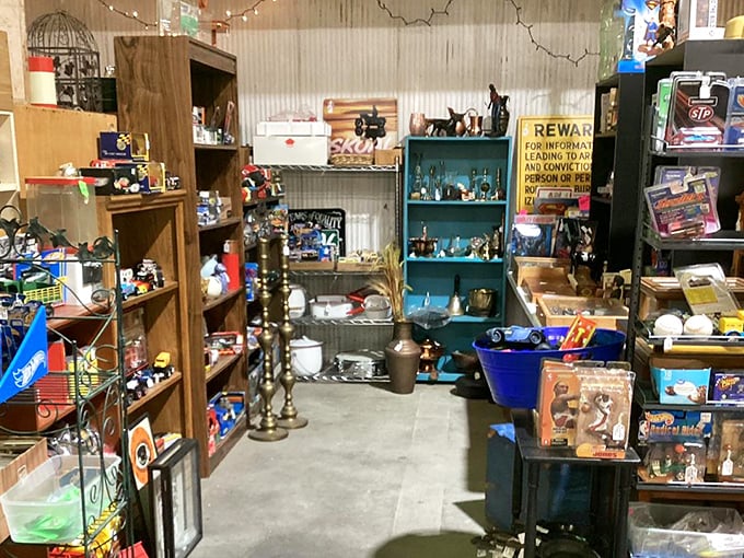 Treasure hunting paradise! Wooden shelves packed with nostalgic collectibles create narrow pathways that feel like stepping into your eccentric aunt's attic&mdash;only better organized.