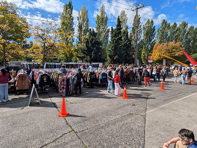 Treasure hunters navigate rows of vintage clothing under Seattle's autumn sky, where fashion from every decade awaits its second chance at stardom.