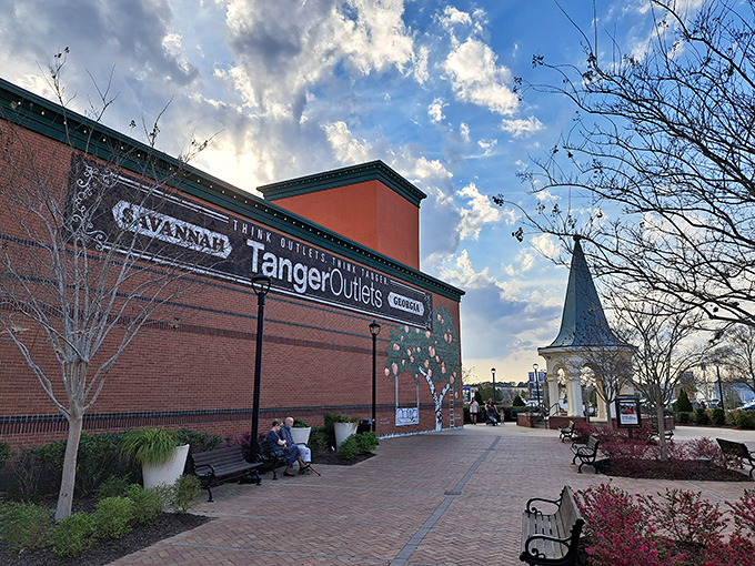 The iconic brick fa&ccedil;ade of Tanger Outlets Savannah welcomes bargain hunters like a retail oasis in the Georgia heat. Shopping salvation awaits!