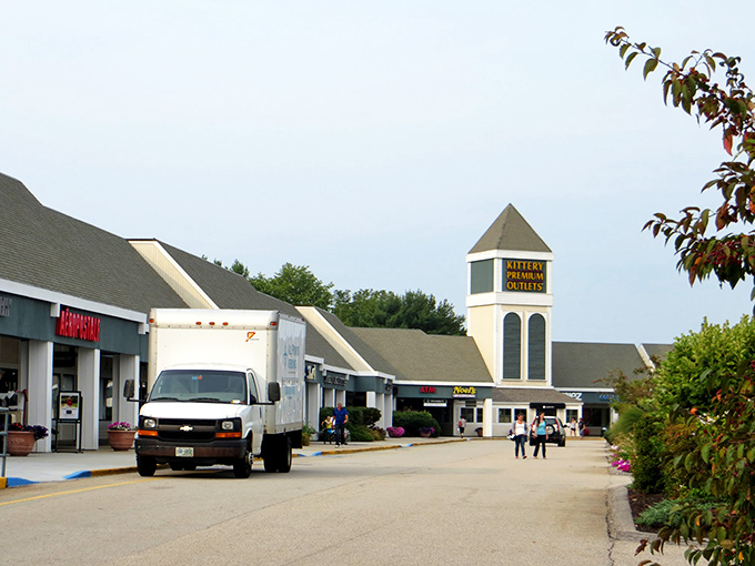The iconic Kittery Premium Outlets tower stands like a retail lighthouse, guiding bargain hunters to safe harbor in a sea of shopping possibilities.