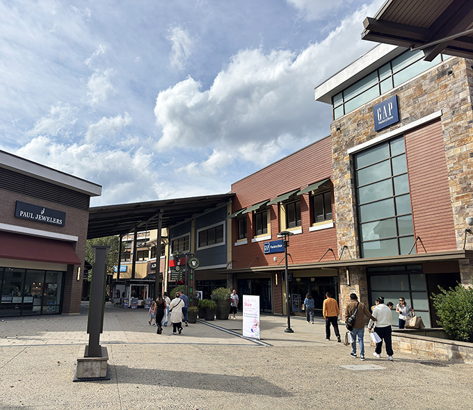 The modern, open-air design of Clarksburg Premium Outlets invites shoppers to stroll between stores while enjoying Maryland's beautiful skies overhead.
