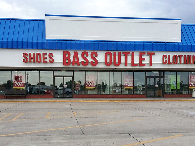 The iconic blue-roofed Bass Outlet beckons with its bold "70% OFF" signs &ndash; a siren call to bargain hunters everywhere.