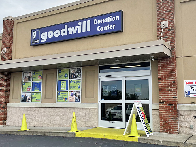 The donation center entrance stands ready with bright yellow cones &ndash; the starting line for treasures beginning their journey to someone else's home.