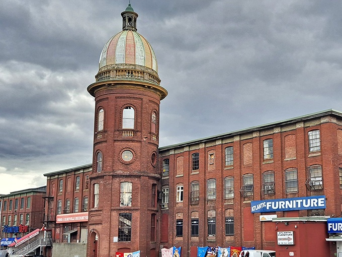 The historic brick fa&ccedil;ade of Big Top Flea Market beckons treasure hunters with its no-frills entrance and promise of weekend wonders within.