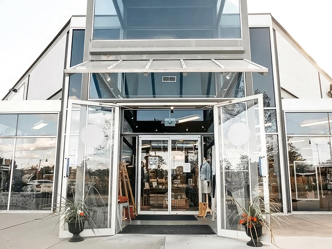 The modern glass entrance of Amanda's Exchange beckons like a portal to a treasure-filled dimension where bargain hunting becomes an art form.
