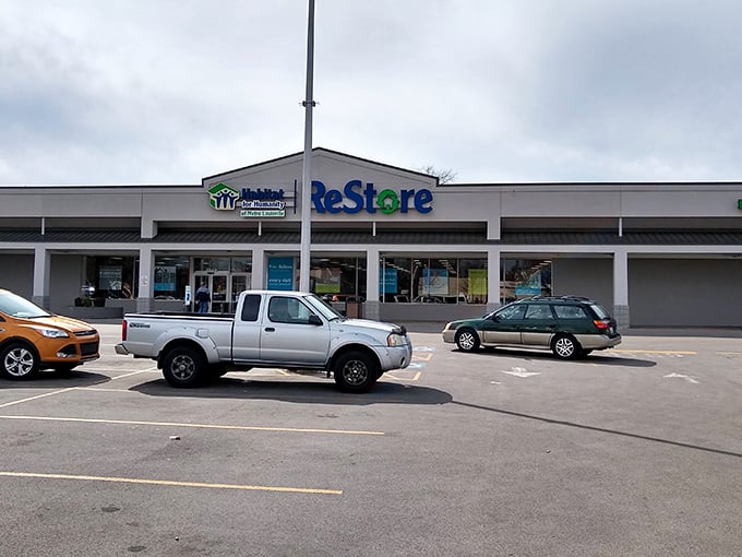 The Hikes Point ReStore exterior features the iconic blue and green logo, a beacon for budget-conscious decorators.