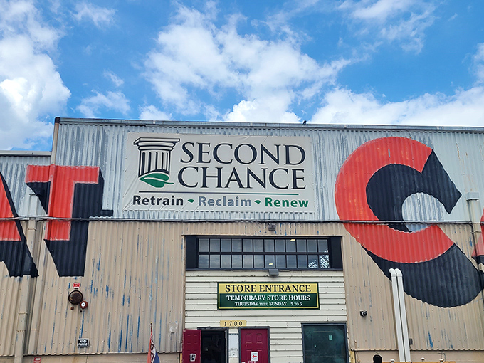 The industrial facade of Second Chance Inc. promises treasure hunting adventures behind those red doors. Retrain, Reclaim, Renew isn't just a slogan&mdash;it's a lifestyle revolution.