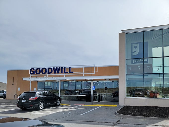 The modern exterior of Papillion's Goodwill beckons with promise &ndash; architectural ambition meets thrifty treasures behind those gleaming glass doors.
