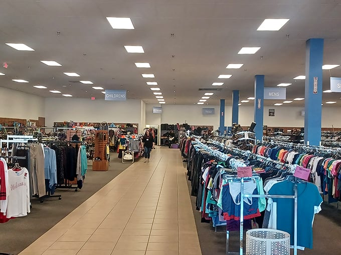 Department store organization meets treasure hunt excitement &ndash; blue pillars guide shoppers through a sea of possibilities where yesterday's trends become tomorrow's statement pieces.