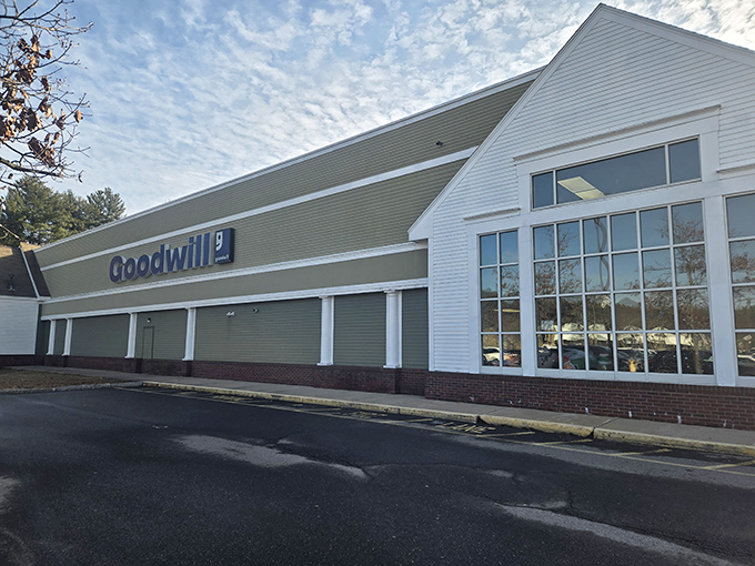 The green and white exterior of Hudson's Goodwill beckons like a siren song to bargain hunters. Treasure awaits behind those automatic doors!