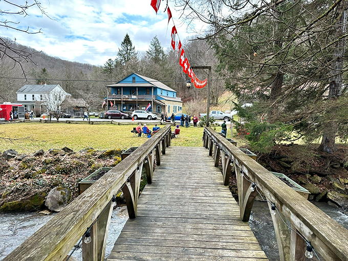 A rustic wooden footbridge leads to Helvetia's heart, where Swiss flags flutter above buildings that look plucked straight from an Alpine postcard.