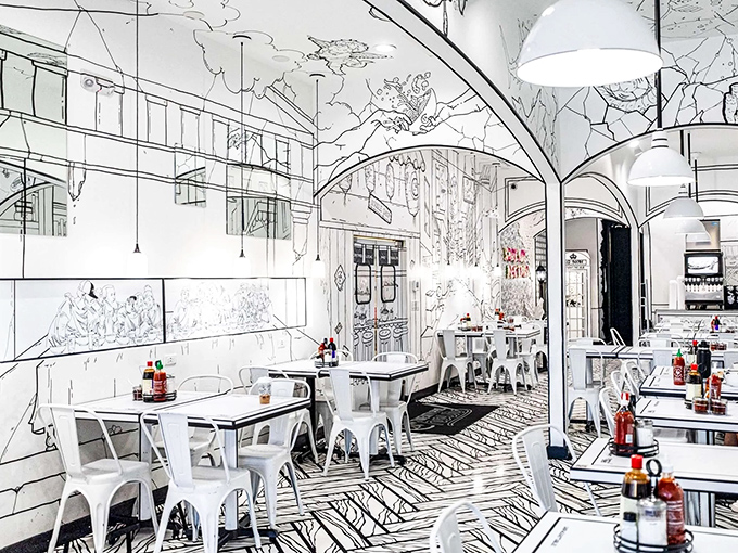 Dining under hand-drawn clouds and outlined archways feels like you've jumped inside your favorite graphic novel—with better food options.
