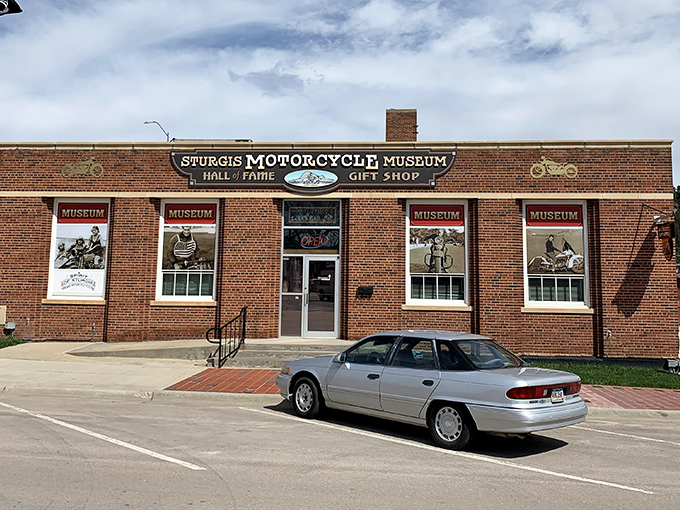 The brick facade of the Sturgis Motorcycle Museum stands like a temple to two-wheeled freedom, beckoning visitors with promises of chrome and glory.