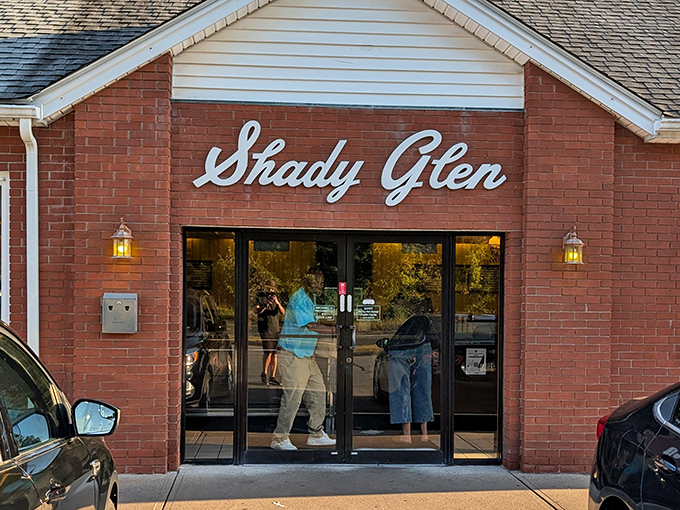 Behind these glass doors lies a world where calories don't count and the cheese skirts are always perfectly crispy.