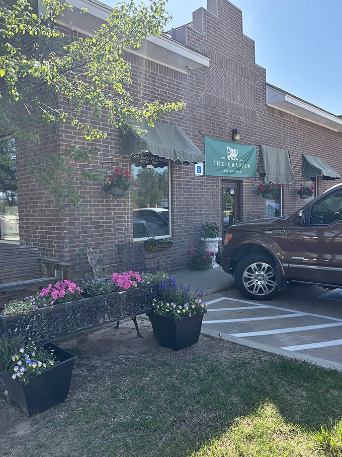 Like the entrance to Narnia, this doorway beckons with promises of forgotten worlds inside. The classical urns standing guard are your first clue.