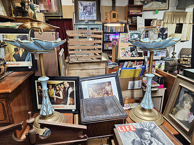 The distinctive red and white exterior of Nitro Antique Mall beckons treasure hunters with its eye-catching mural and stone accents—architectural character that hints at the wonders within.