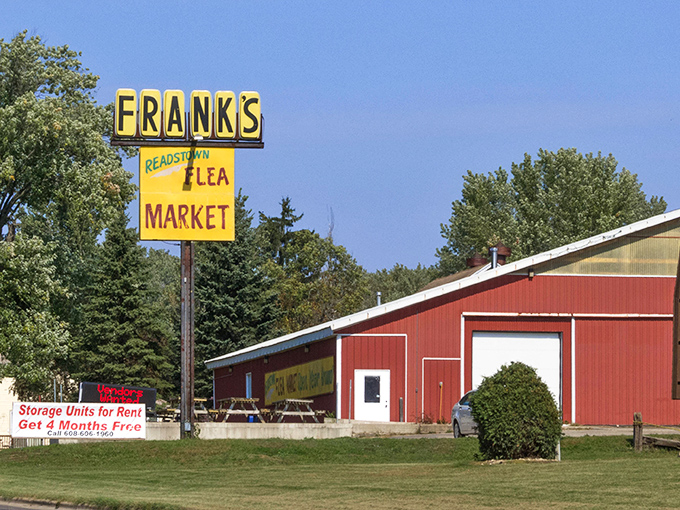 Like a beacon for bargain hunters, the bright yellow sign stands tall against Wisconsin's blue skies, promising deals that'll make your wallet smile.
