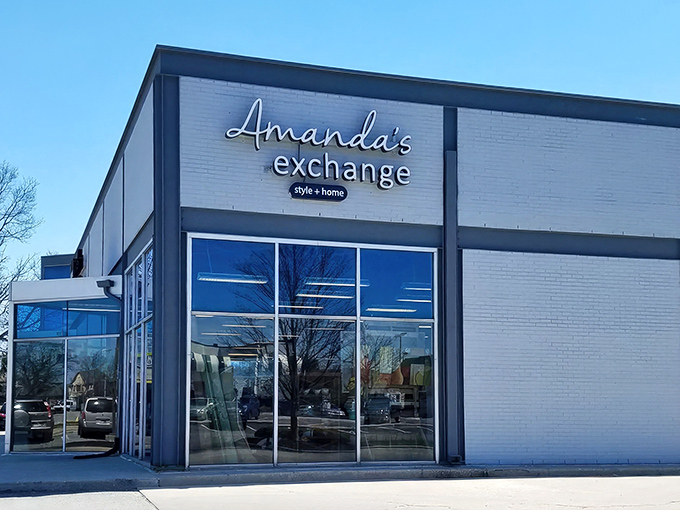 Elegant signage against crisp white brick &ndash; Amanda's Exchange isn't your grandmother's thrift store, though she'd absolutely love shopping here too.