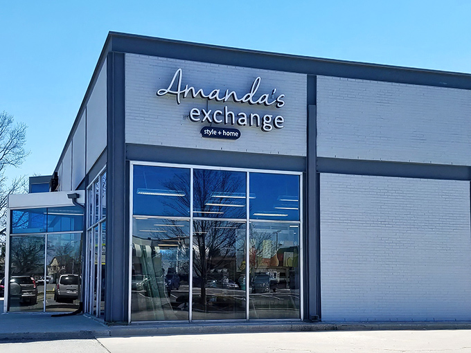 Elegant signage against crisp white brick – Amanda's Exchange isn't your grandmother's thrift store, though she'd absolutely love shopping here too.