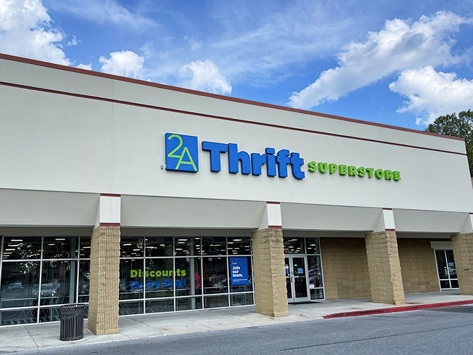 The unassuming exterior of 2nd Ave Thrift Superstore in Columbia belies the treasure trove waiting inside. Blue skies promise adventure for bargain hunters.