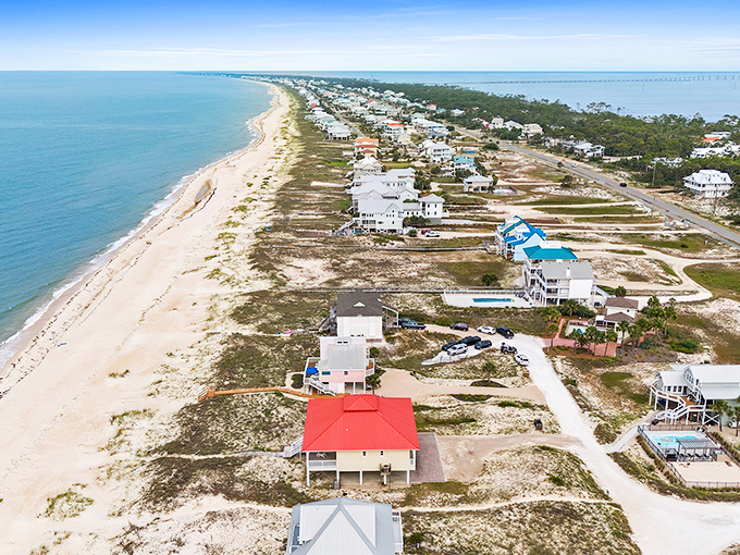 Eastpoint's pristine shoreline stretches like nature's welcome mat, where beachfront homes enjoy million-dollar views without the million-dollar price tags.