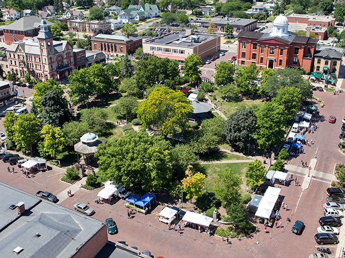 Woodstock's historic square from above looks like a movie set—because it actually was one! The perfect small-town charm that made Bill Murray want to stay forever.