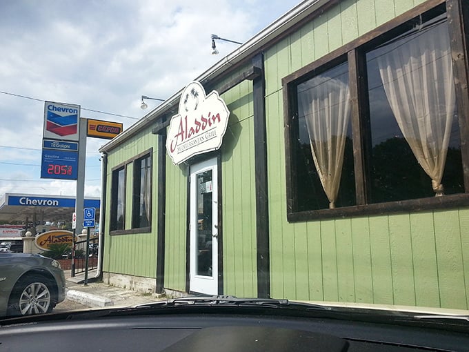 The unassuming green exterior of Aladdin Mediterranean Grill proves that culinary magic often hides in the most unexpected Jackson locations.