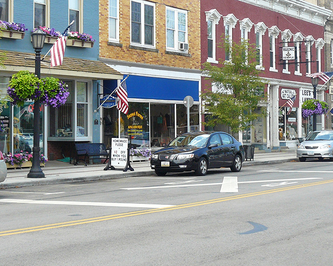 Vermilion's historic downtown showcases colorful storefronts with flower baskets and American flags, creating that perfect small-town atmosphere that makes you want to linger all afternoon.