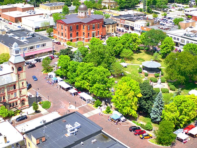 A bird's-eye view of Woodstock showcases the perfect balance of nature and architecture &ndash; where trees and Victorian buildings coexist in small-town harmony.