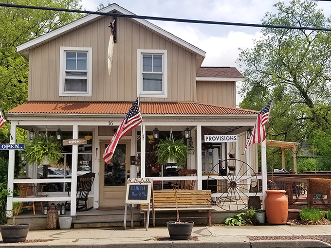 The storybook exterior of Butterfields Cafe beckons like a siren song to breakfast lovers. American flags flutter proudly above this charming two-story haven of morning delights.