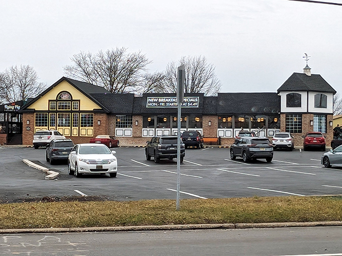 The Limerick Diner's charming exterior combines brick, yellow siding, and that distinctive little tower&mdash;architectural personality that promises good things inside.