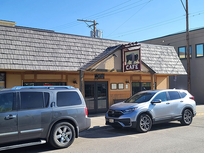 The iconic buffalo sign beckons hungry travelers like a breakfast lighthouse. This rustic wooden exterior with its weathered charm promises Montana hospitality inside.
