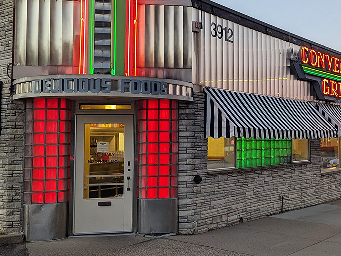 The neon-lit entrance of Convention Grill glows like a beacon from another era, promising delicious comfort food and a hefty dose of nostalgia.