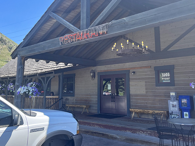 That neon "RESTAURANT" sign isn't just an announcement&mdash;it's a beacon of hope for hungry travelers seeking refuge from fancy food fatigue.