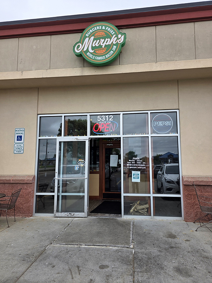 That cheerful green sign and those outdoor tables are calling your name louder than a dinner bell.