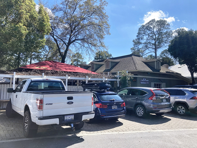 A packed parking lot tells the real story—this no-frills eatery draws crowds willing to wait for authentic Lowcountry cuisine.