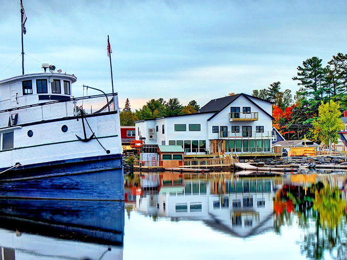 Greenville's waterfront captures Maine's magic &ndash; historic vessels and lakeside buildings perfectly mirrored in Moosehead Lake's glass-like waters.