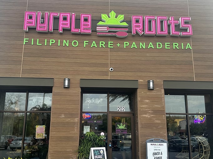 The neon purple sign glows like a beacon of Filipino flavor, promising culinary adventures that'll make your taste buds do the happy dance.