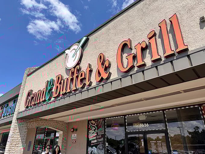 The bold red lettering of GrandE Buffet & Grill beckons like a lighthouse to hungry sailors on the culinary seas of Laurel.