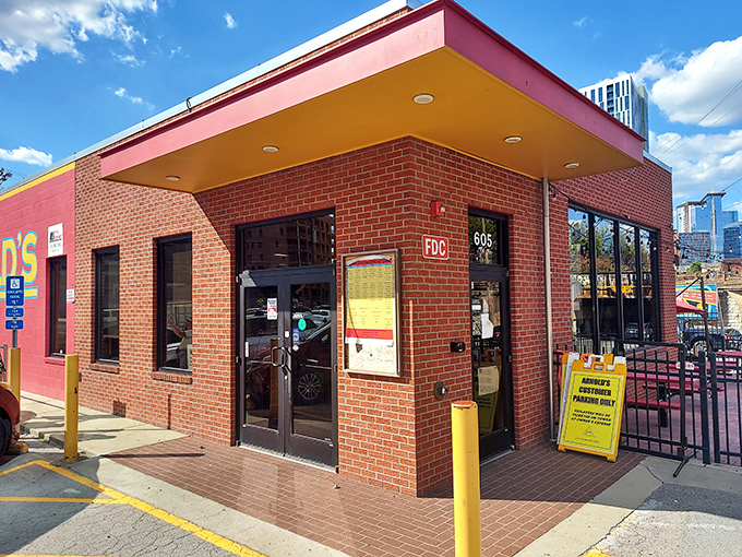 Arnold's brick exterior stands like a culinary lighthouse against Nashville's modern skyline, promising comfort food salvation to hungry souls.