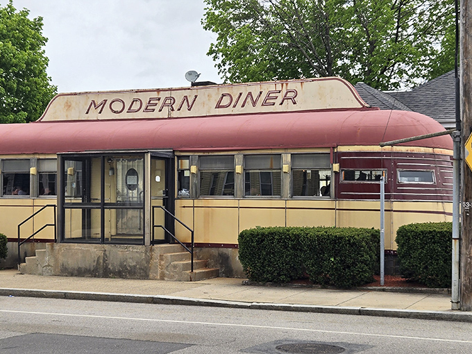 The Modern Diner's iconic Sterling Streamliner exterior stands as a time capsule of mid-century Americana, its curved roof and vintage signage beckoning hungry travelers.