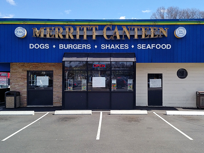 The iconic blue exterior of Merritt Canteen stands as a beacon of comfort food in Bridgeport, promising simple pleasures that have kept locals coming back for generations.