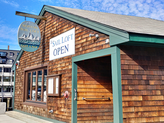 The quintessential New England seafood joint sign&mdash;three sailboats riding blue waves&mdash;promises maritime delights within. No neon required.