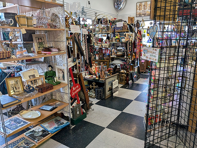 The brick fa&ccedil;ade of Antiques & Treasures ROCK! stands like a time portal on Victorian Avenue, promising adventures through decades past for curious Nevada treasure hunters.
