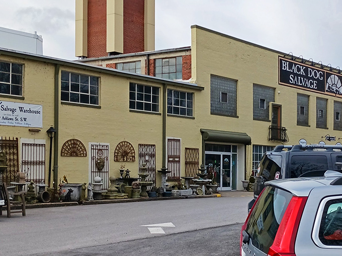 The iconic yellow brick exterior of Black Dog Salvage stands as a beacon for treasure hunters, its smokestack reaching skyward like an industrial lighthouse.