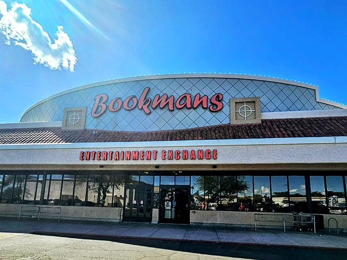 The iconic Bookmans storefront stands like a beacon of hope for treasure hunters under the brilliant Arizona sky. Your wallet's happy place awaits.
