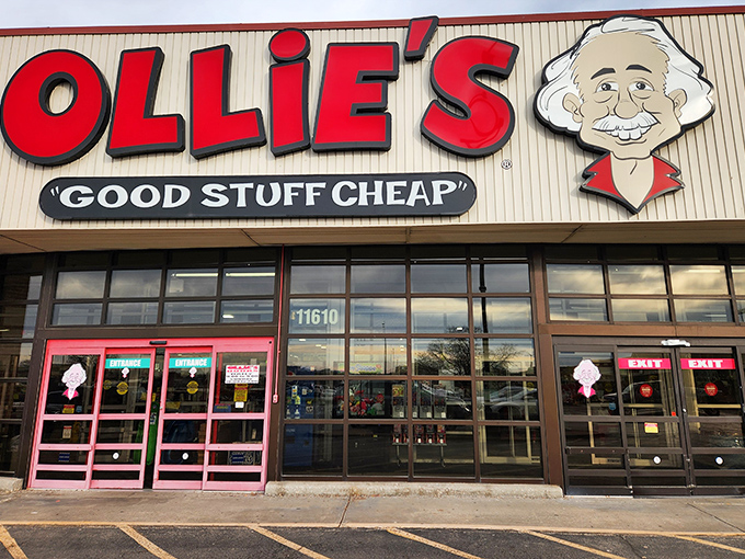 The iconic red and white Ollie's sign promises treasure hunting adventures within. That cartoon mascot knows you're about to score some serious bargains.